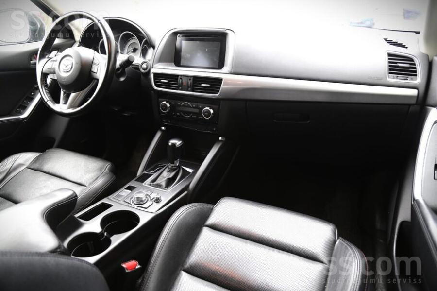 Black Mazda CX-5 2015 in Riga, with an engine capacity of 2.20 L and mileage of 230 thousand km for 7995 €, photo 12 on AUTOMOTO.COM.LV