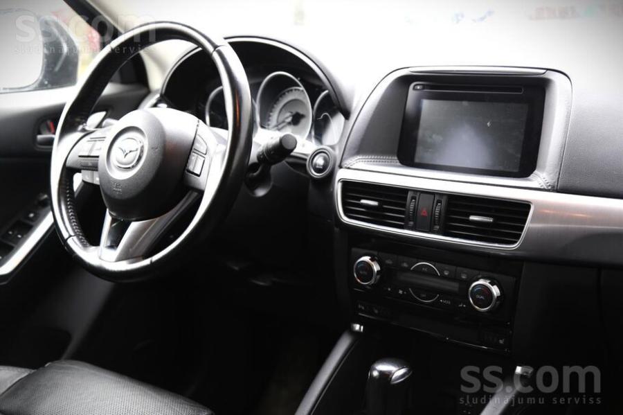 Black Mazda CX-5 2015 in Riga, with an engine capacity of 2.20 L and mileage of 230 thousand km for 7995 €, photo 13 on AUTOMOTO.COM.LV