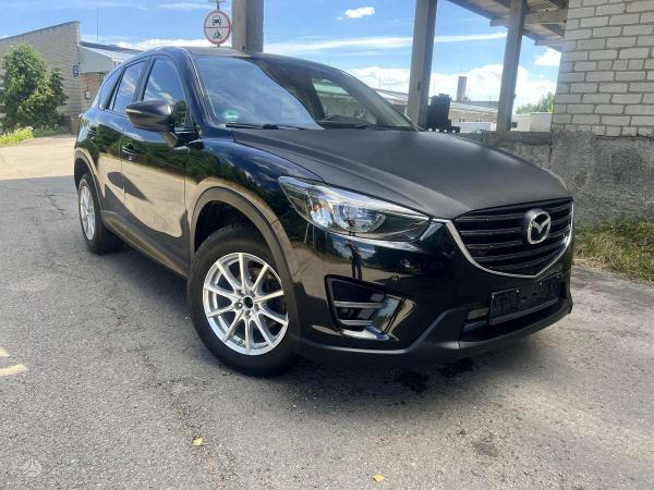 Black Mazda CX-5 2015 in Kelme, with an engine capacity of 2.19 L and mileage of 219 thousand km for 8300 €, photo 1 on AUTOMOTO.COM.LV