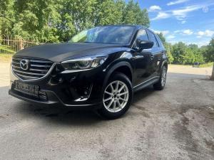 Black Mazda CX-5 2015 in Kelme, with an engine capacity of 2.19 L and mileage of 219 thousand km for 8300 €, photo 4 on AUTOMOTO.COM.LV