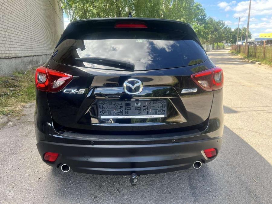 Black Mazda CX-5 2015 in Kelme, with an engine capacity of 2.19 L and mileage of 219 thousand km for 8300 €, photo 5 on AUTOMOTO.COM.LV