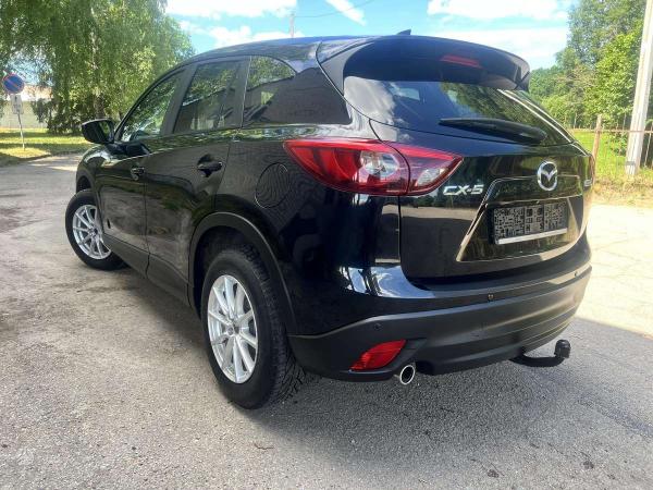 Black Mazda CX-5 2015 in Kelme, with an engine capacity of 2.19 L and mileage of 219 thousand km for 8300 €, photo 5 on AUTOMOTO.COM.LV
