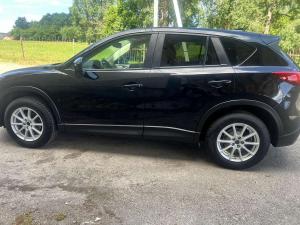 Black Mazda CX-5 2015 in Kelme, with an engine capacity of 2.19 L and mileage of 219 thousand km for 8300 €, photo 8 on AUTOMOTO.COM.LV