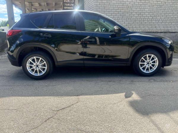 Black Mazda CX-5 2015 in Kelme, with an engine capacity of 2.19 L and mileage of 219 thousand km for 8300 €, photo 8 on AUTOMOTO.COM.LV