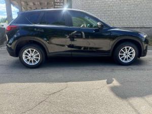 Black Mazda CX-5 2015 in Kelme, with an engine capacity of 2.19 L and mileage of 219 thousand km for 8300 €, photo 9 on AUTOMOTO.COM.LV