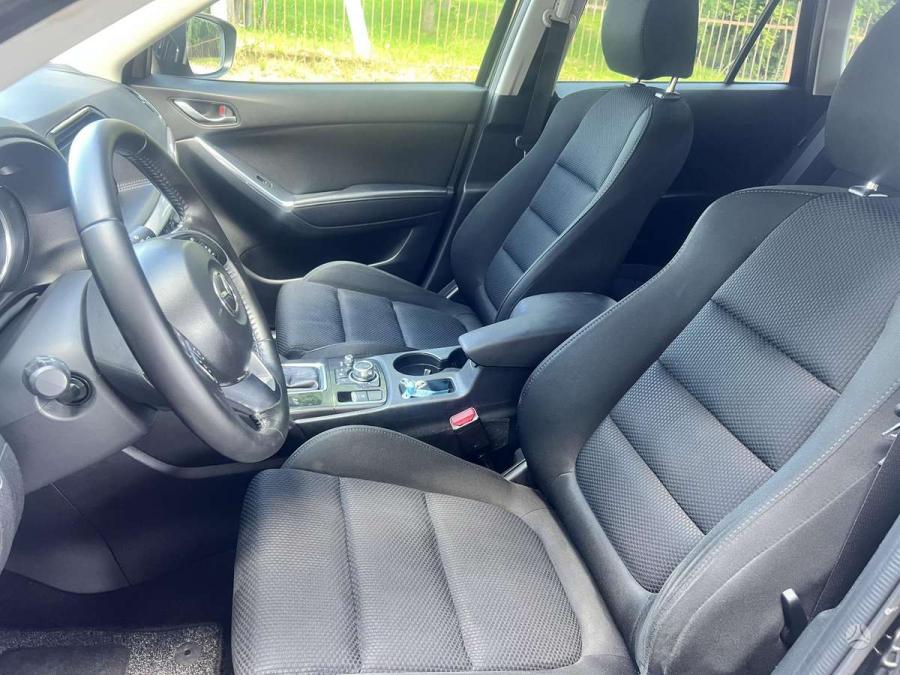 Black Mazda CX-5 2015 in Kelme, with an engine capacity of 2.19 L and mileage of 219 thousand km for 8300 €, photo 13 on AUTOMOTO.COM.LV