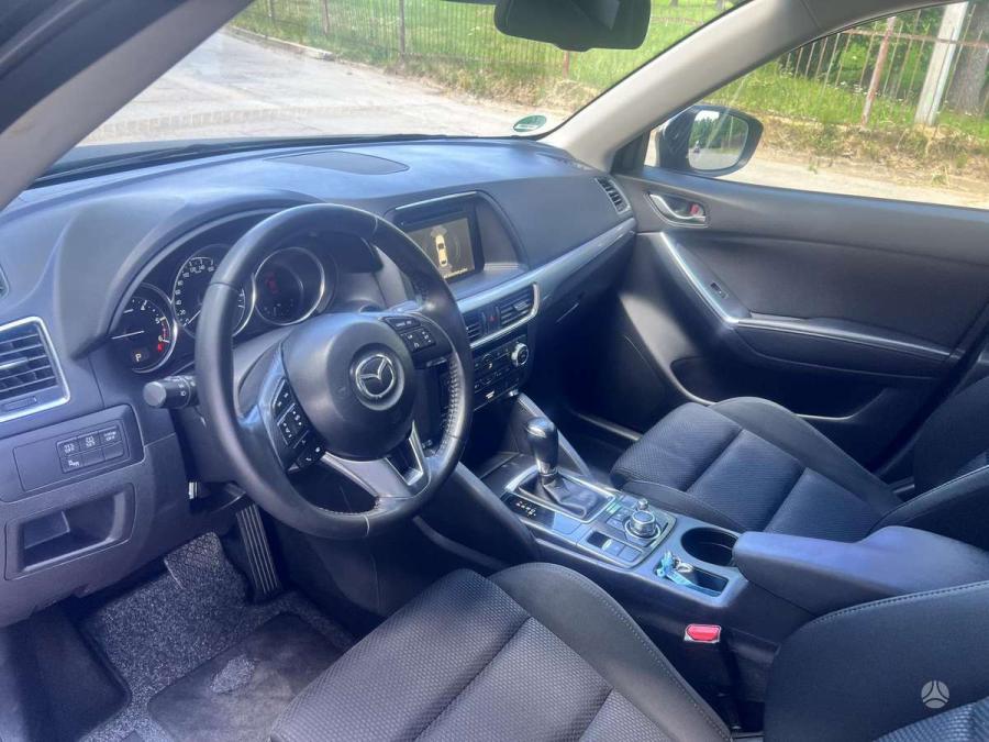 Black Mazda CX-5 2015 in Kelme, with an engine capacity of 2.19 L and mileage of 219 thousand km for 8300 €, photo 14 on AUTOMOTO.COM.LV