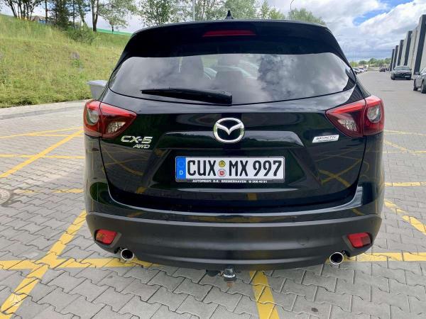 Black Mazda CX-5 2015 in Vilnius, with an engine capacity of 2.20 L and mileage of 230 thousand km for 7700 €, photo 4 on AUTOMOTO.COM.LV