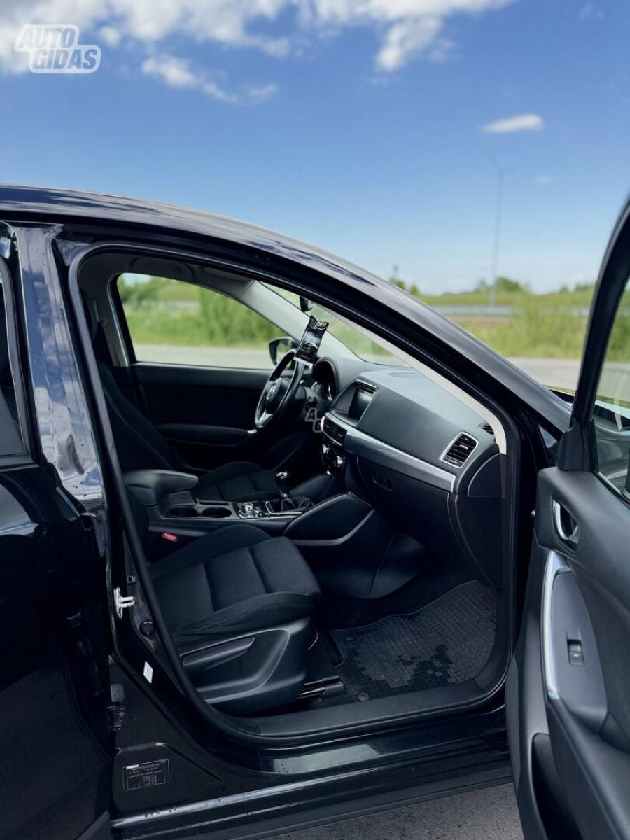 Melns Mazda CX-5 2015 Radviliškis, ar dzinēja tilpumu 2.20 L un nobraukumu 161 tūkst. km par 8000 €, foto 17 vietnē AUTOMOTO.COM.LV