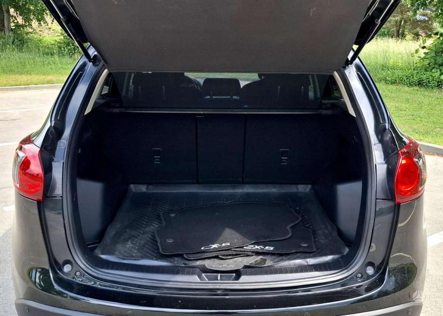 Black Mazda CX-5 2015 in Taurage, with an engine capacity of 2.19 L and mileage of 222 thousand km for 4800 €, photo 17 on AUTOMOTO.COM.LV