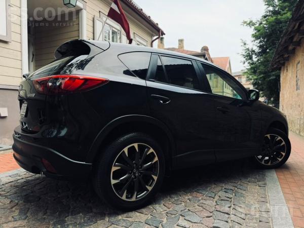 Melns Mazda CX-5 2015 Cēsis, ar dzinēja tilpumu 2.20 L un nobraukumu 0 tūkst. km par 9990 €, foto 6 vietnē AUTOMOTO.COM.LV
