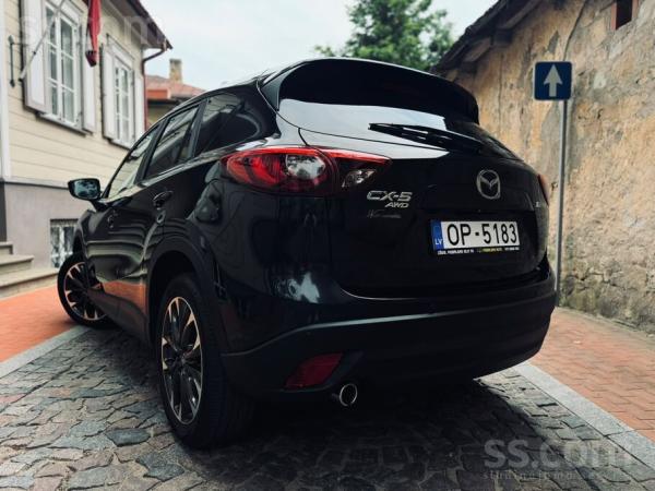 Melns Mazda CX-5 2015 Cēsis, ar dzinēja tilpumu 2.20 L un nobraukumu 0 tūkst. km par 9990 €, foto 7 vietnē AUTOMOTO.COM.LV