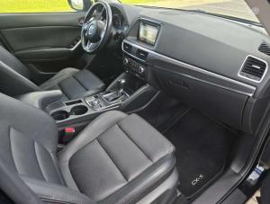 Black Mazda CX-5 2015 in Panevezys, with an engine capacity of 2.19 L and mileage of 147 thousand km for 9799 €, photo 13 on AUTOMOTO.COM.LV
