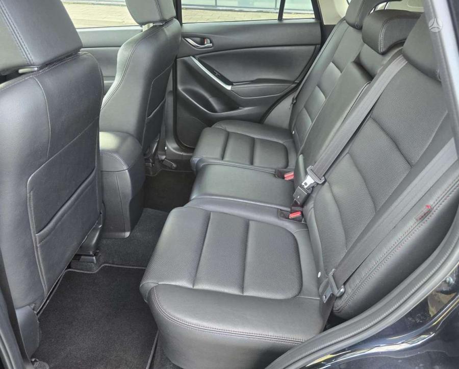Black Mazda CX-5 2015 in Panevezys, with an engine capacity of 2.19 L and mileage of 147 thousand km for 9799 €, photo 23 on AUTOMOTO.COM.LV