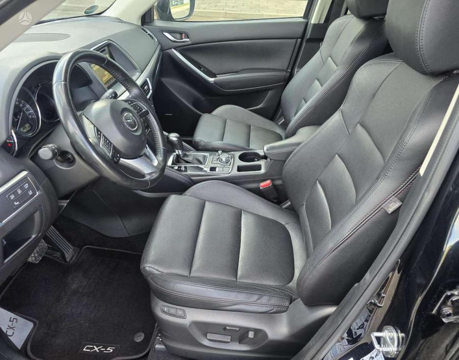 Black Mazda CX-5 2015 in Panevezys, with an engine capacity of 2.19 L and mileage of 147 thousand km for 9799 €, photo 25 on AUTOMOTO.COM.LV