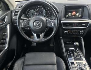 Black Mazda CX-5 2015 in Panevezys, with an engine capacity of 2.19 L and mileage of 147 thousand km for 9799 €, photo 33 on AUTOMOTO.COM.LV