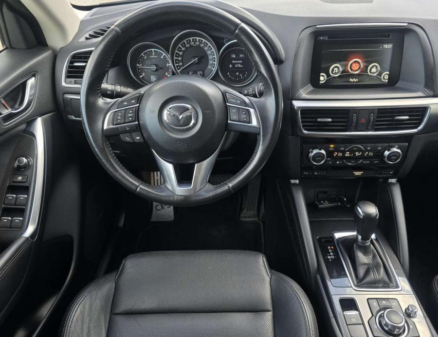 Black Mazda CX-5 2015 in Panevezys, with an engine capacity of 2.19 L and mileage of 147 thousand km for 9799 €, photo 33 on AUTOMOTO.COM.LV