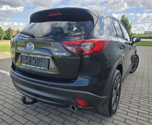 Black Mazda CX-5 2015 in Panevezys, with an engine capacity of 2.19 L and mileage of 147 thousand km for 9799 €, photo 3 on AUTOMOTO.COM.LV