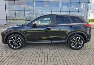 Black Mazda CX-5 2015 in Panevezys, with an engine capacity of 2.19 L and mileage of 147 thousand km for 9799 €, photo 4 on AUTOMOTO.COM.LV