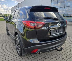 Black Mazda CX-5 2015 in Panevezys, with an engine capacity of 2.19 L and mileage of 147 thousand km for 9799 €, photo 5 on AUTOMOTO.COM.LV