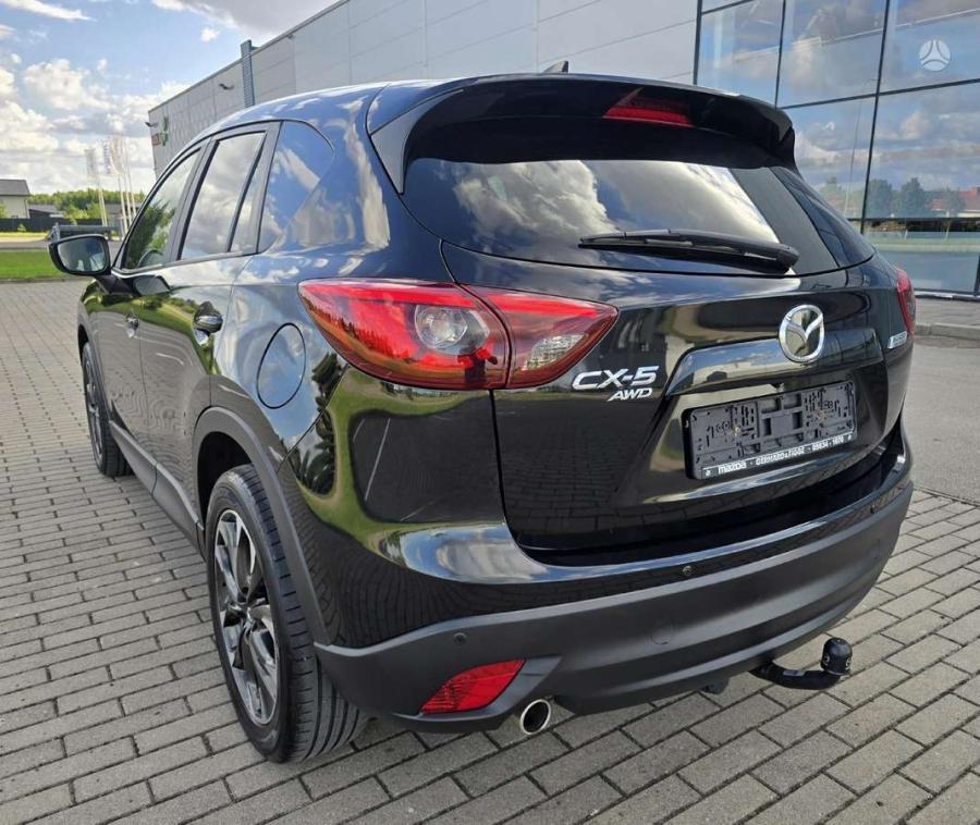 Black Mazda CX-5 2015 in Panevezys, with an engine capacity of 2.19 L and mileage of 147 thousand km for 9799 €, photo 5 on AUTOMOTO.COM.LV
