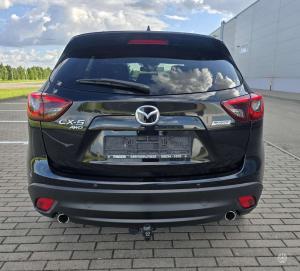 Black Mazda CX-5 2015 in Panevezys, with an engine capacity of 2.19 L and mileage of 147 thousand km for 9799 €, photo 6 on AUTOMOTO.COM.LV