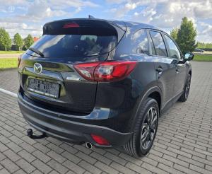 Black Mazda CX-5 2015 in Panevezys, with an engine capacity of 2.19 L and mileage of 147 thousand km for 9799 €, photo 7 on AUTOMOTO.COM.LV
