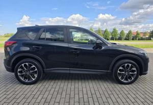 Black Mazda CX-5 2015 in Panevezys, with an engine capacity of 2.19 L and mileage of 147 thousand km for 9799 €, photo 8 on AUTOMOTO.COM.LV