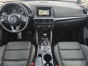 Black Mazda CX-5 2015 in Panevezys, with an engine capacity of 2.19 L and mileage of 147 thousand km for 9799 €, photo 12 on AUTOMOTO.COM.LV