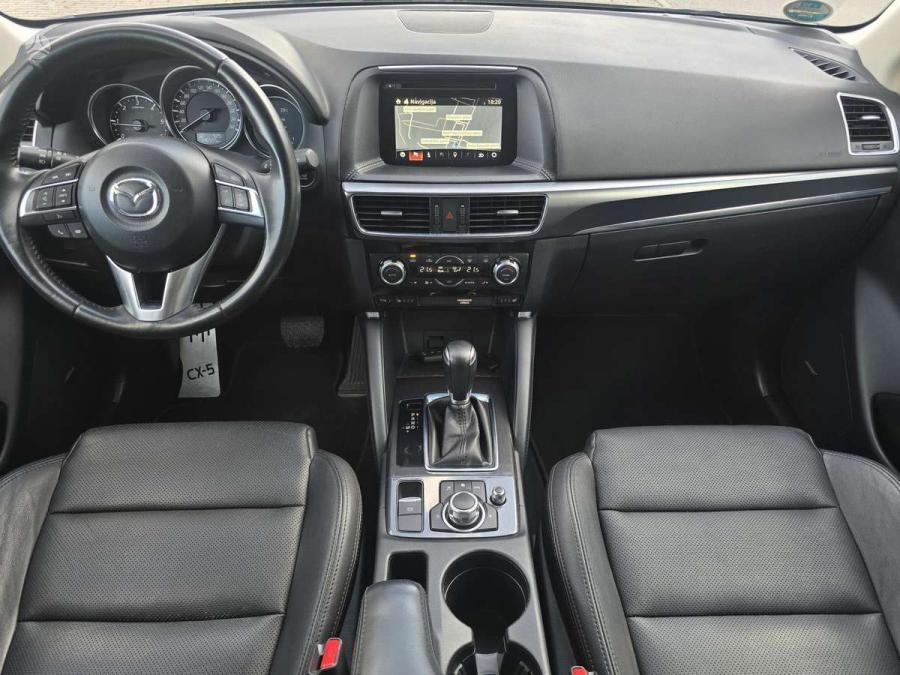 Black Mazda CX-5 2015 in Panevezys, with an engine capacity of 2.19 L and mileage of 147 thousand km for 9799 €, photo 12 on AUTOMOTO.COM.LV