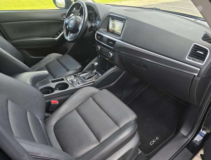 Black Mazda CX-5 2015 in Panevezys, with an engine capacity of 2.19 L and mileage of 147 thousand km for 9799 €, photo 14 on AUTOMOTO.COM.LV