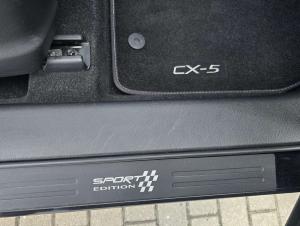 Black Mazda CX-5 2015 in Panevezys, with an engine capacity of 2.19 L and mileage of 147 thousand km for 9799 €, photo 18 on AUTOMOTO.COM.LV