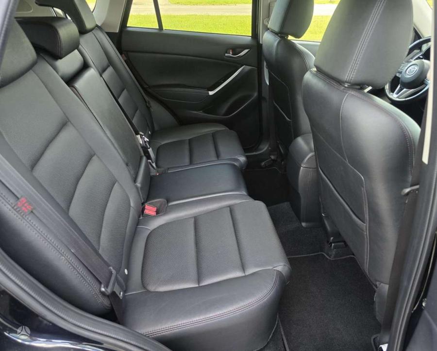 Black Mazda CX-5 2015 in Panevezys, with an engine capacity of 2.19 L and mileage of 147 thousand km for 9799 €, photo 20 on AUTOMOTO.COM.LV