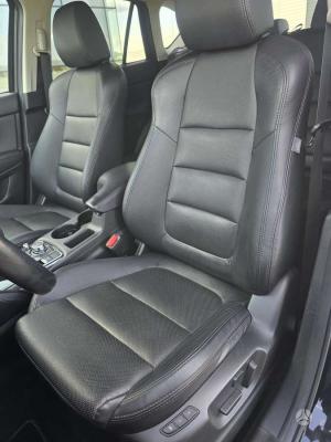 Black Mazda CX-5 2015 in Panevezys, with an engine capacity of 2.19 L and mileage of 147 thousand km for 9799 €, photo 28 on AUTOMOTO.COM.LV