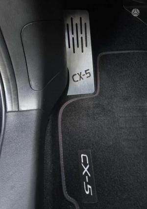 Black Mazda CX-5 2015 in Panevezys, with an engine capacity of 2.19 L and mileage of 147 thousand km for 9799 €, photo 32 on AUTOMOTO.COM.LV
