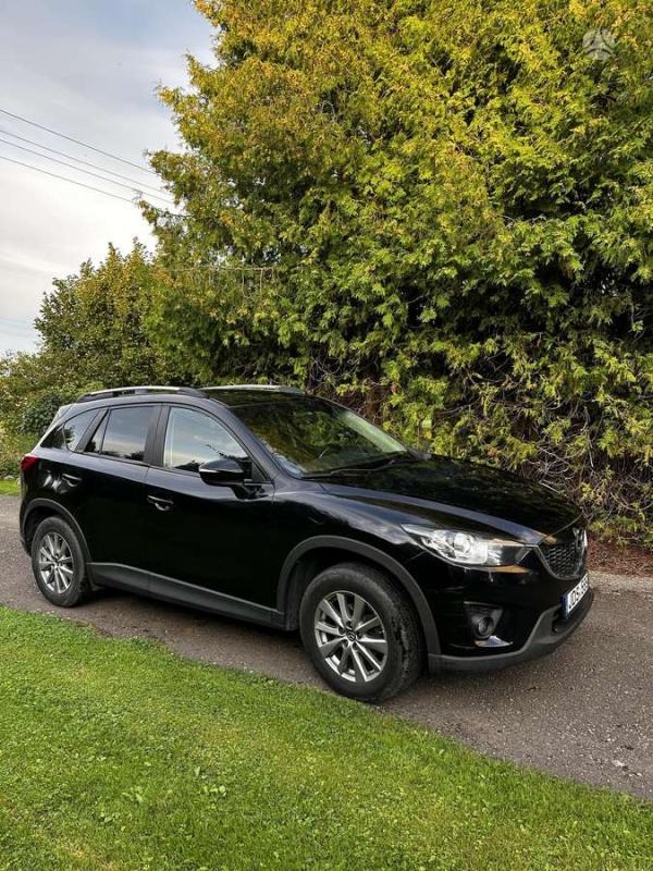 Melns Mazda CX-5 2015 Šauļi, ar dzinēja tilpumu 2.49 L un nobraukumu 130 tūkst. km par 7999 €, foto 1 vietnē AUTOMOTO.COM.LV