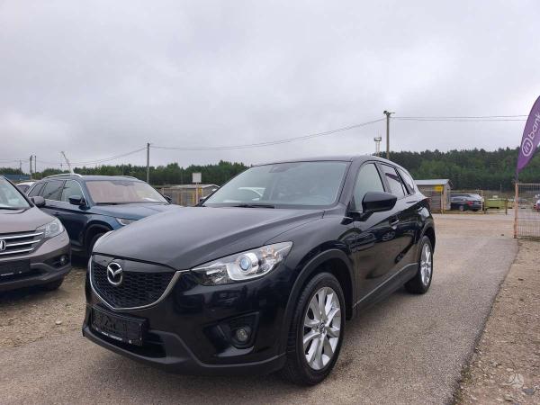 Black Mazda CX-5 2015 in Vilnius, with an engine capacity of 2.00 L and mileage of 120 thousand km for 13650 €, photo 1 on AUTOMOTO.COM.LV