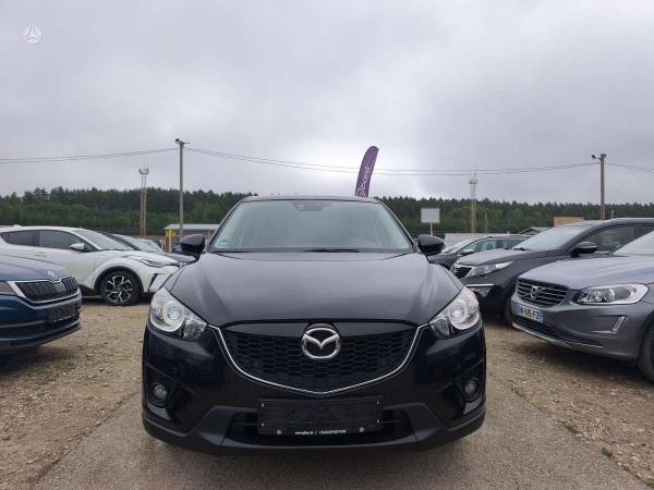 Black Mazda CX-5 2015 in Vilnius, with an engine capacity of 2.00 L and mileage of 120 thousand km for 13650 €, photo 2 on AUTOMOTO.COM.LV