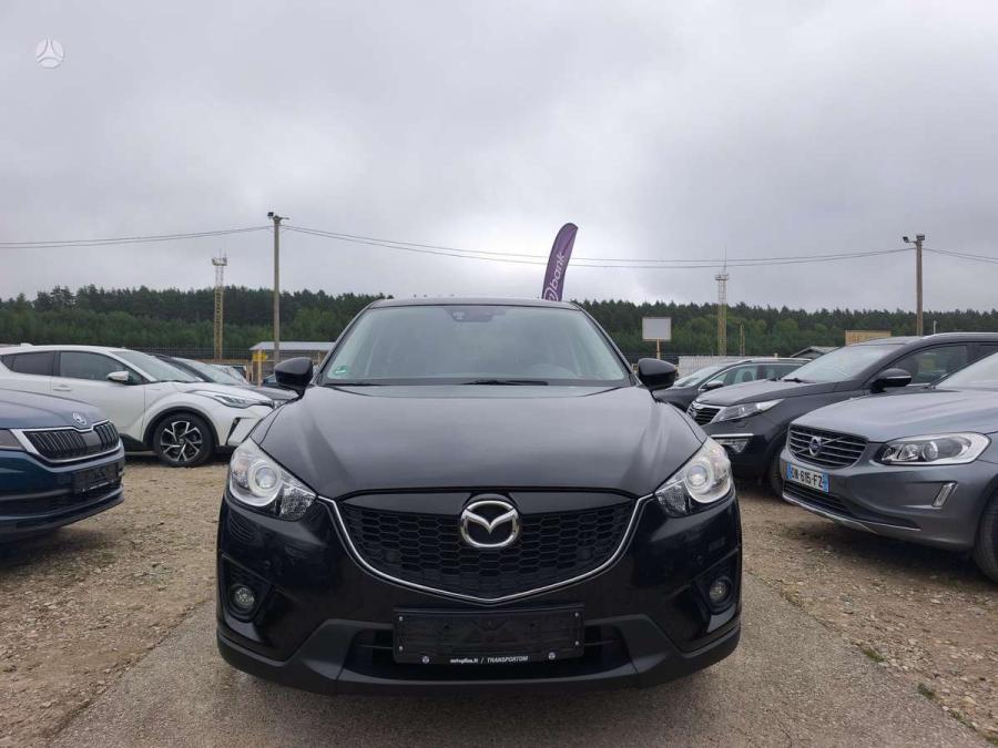 Black Mazda CX-5 2015 in Vilnius, with an engine capacity of 2.00 L and mileage of 120 thousand km for 13650 €, photo 3 on AUTOMOTO.COM.LV