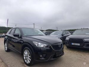 Black Mazda CX-5 2015 in Vilnius, with an engine capacity of 2.00 L and mileage of 120 thousand km for 13650 €, photo 4 on AUTOMOTO.COM.LV