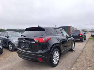 Black Mazda CX-5 2015 in Vilnius, with an engine capacity of 2.00 L and mileage of 120 thousand km for 13650 €, photo 5 on AUTOMOTO.COM.LV