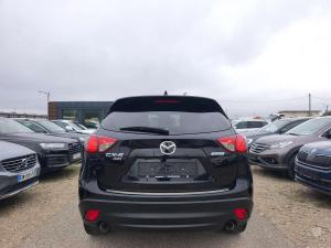 Black Mazda CX-5 2015 in Vilnius, with an engine capacity of 2.00 L and mileage of 120 thousand km for 13650 €, photo 6 on AUTOMOTO.COM.LV