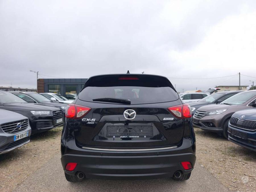 Black Mazda CX-5 2015 in Vilnius, with an engine capacity of 2.00 L and mileage of 120 thousand km for 13650 €, photo 6 on AUTOMOTO.COM.LV