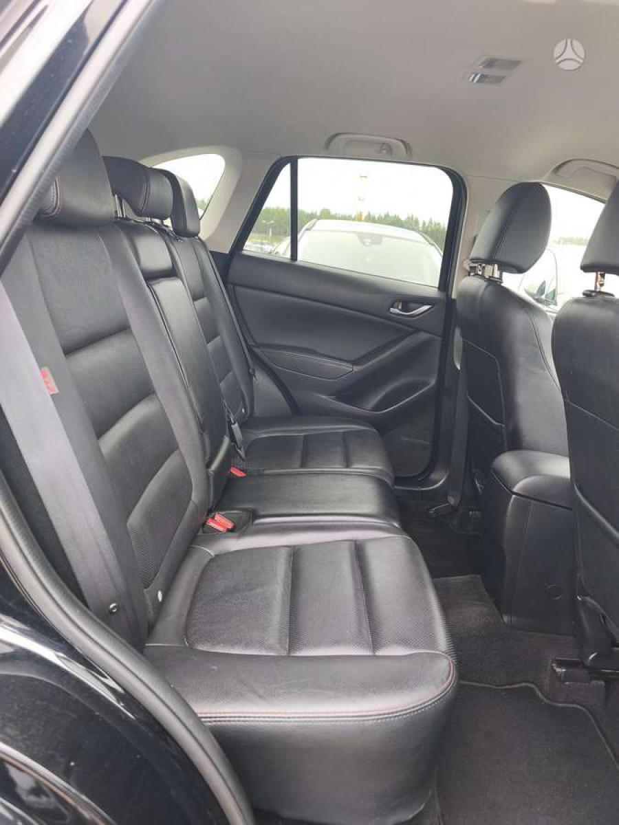 Black Mazda CX-5 2015 in Vilnius, with an engine capacity of 2.00 L and mileage of 120 thousand km for 13650 €, photo 10 on AUTOMOTO.COM.LV