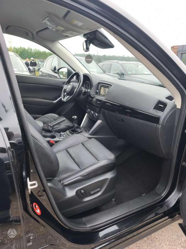 Black Mazda CX-5 2015 in Vilnius, with an engine capacity of 2.00 L and mileage of 120 thousand km for 13650 €, photo 10 on AUTOMOTO.COM.LV