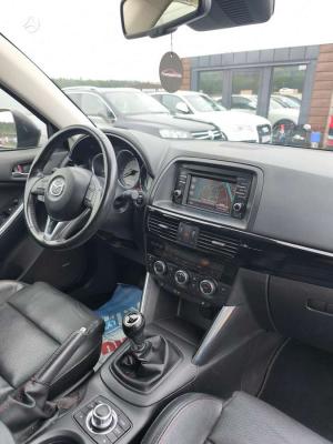 Black Mazda CX-5 2015 in Vilnius, with an engine capacity of 2.00 L and mileage of 120 thousand km for 13650 €, photo 12 on AUTOMOTO.COM.LV