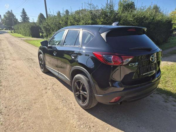 Melns Mazda CX-5 2015 Rokiškis, ar dzinēja tilpumu 2.19 L un nobraukumu 230 tūkst. km par 5950 €, foto 4 vietnē AUTOMOTO.COM.LV