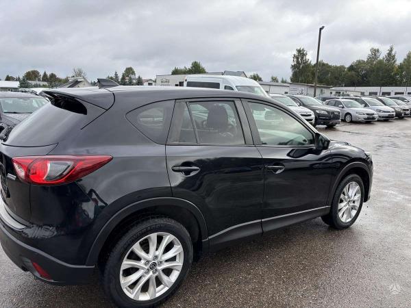 Black Mazda CX-5 2015 in Utena, with an engine capacity of 2.20 L and mileage of 211 thousand km for 6350 €, photo 8 on AUTOMOTO.COM.LV