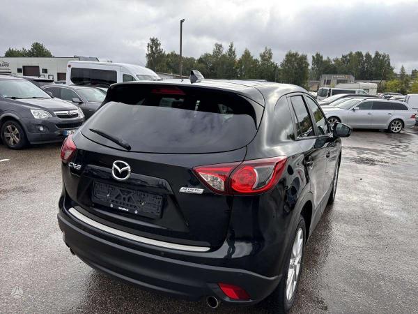 Black Mazda CX-5 2015 in Utena, with an engine capacity of 2.20 L and mileage of 211 thousand km for 6350 €, photo 9 on AUTOMOTO.COM.LV