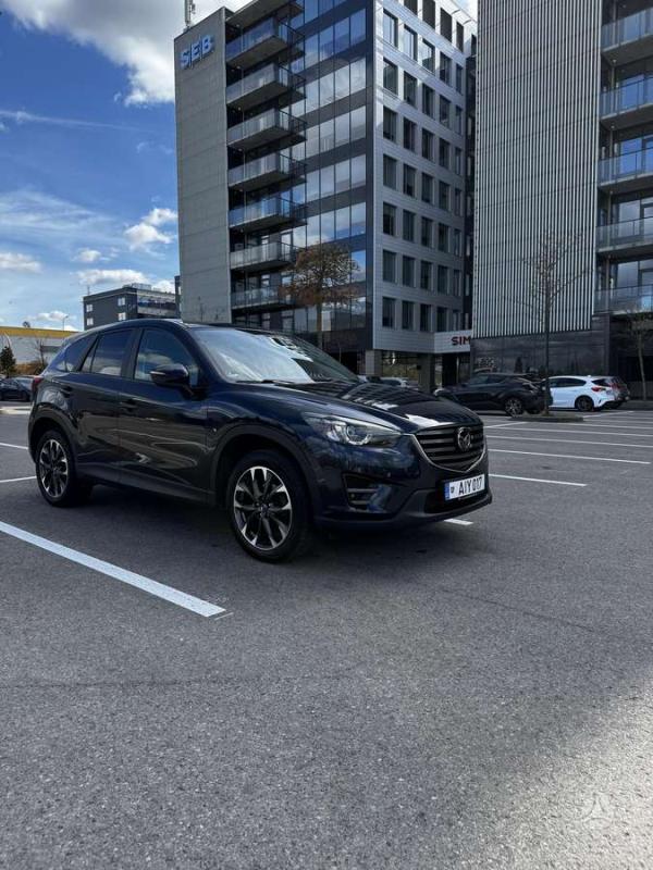 Black Mazda CX-5 2015 in Vilnius, with an engine capacity of 2.19 L and mileage of 219 thousand km for 10200 €, photo 1 on AUTOMOTO.COM.LV